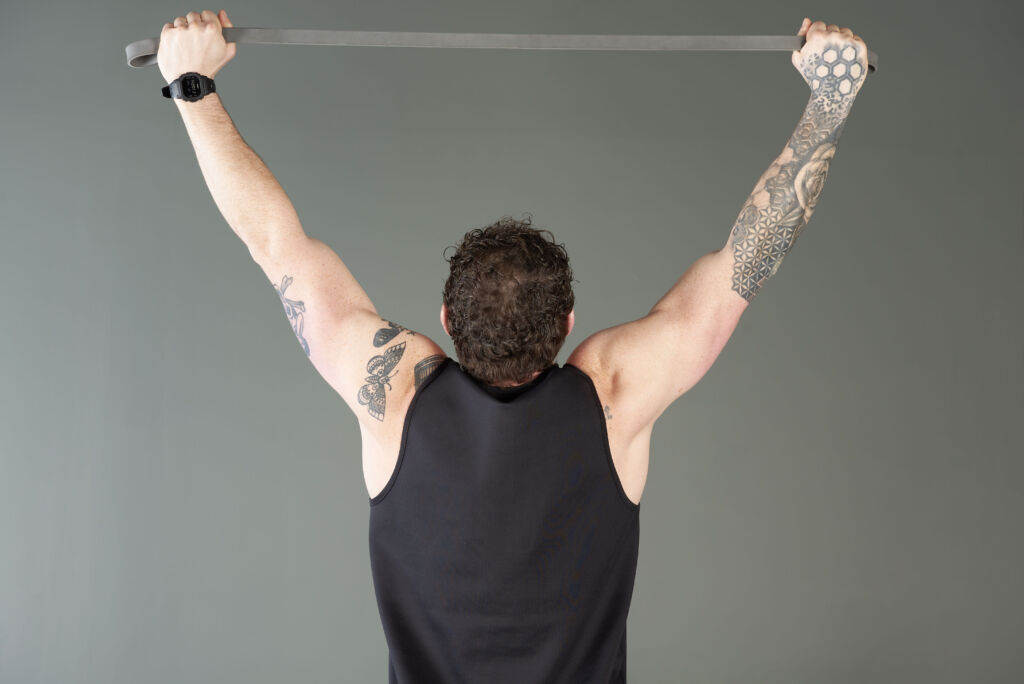 Build Shoulder Strength with Overhead Shrugs | Mirafit